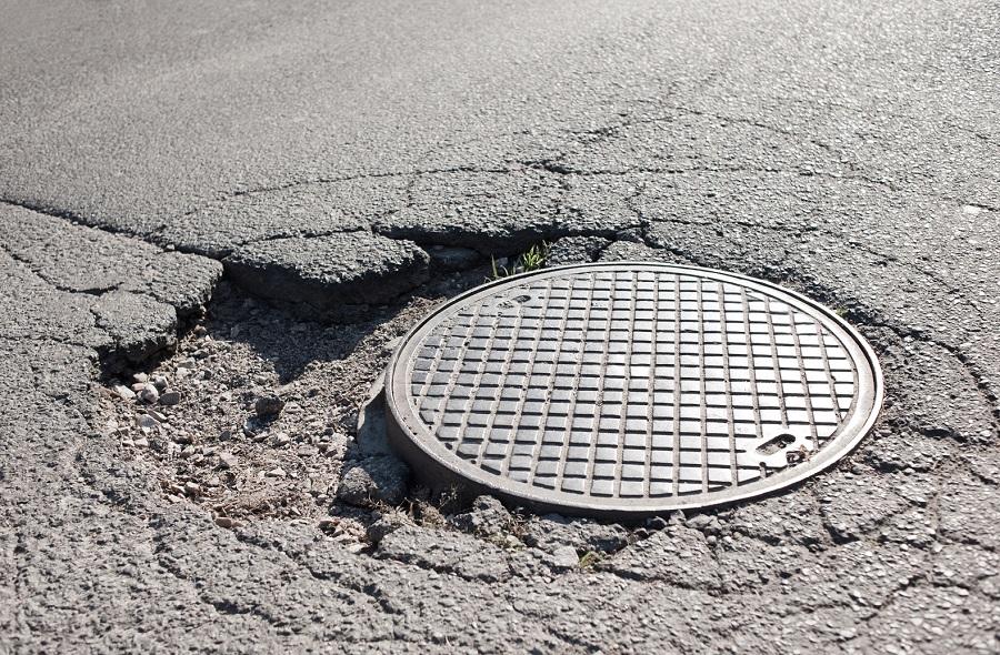 Adjusting Buried Manhole Covers on Kennedy Ave. – DOM767